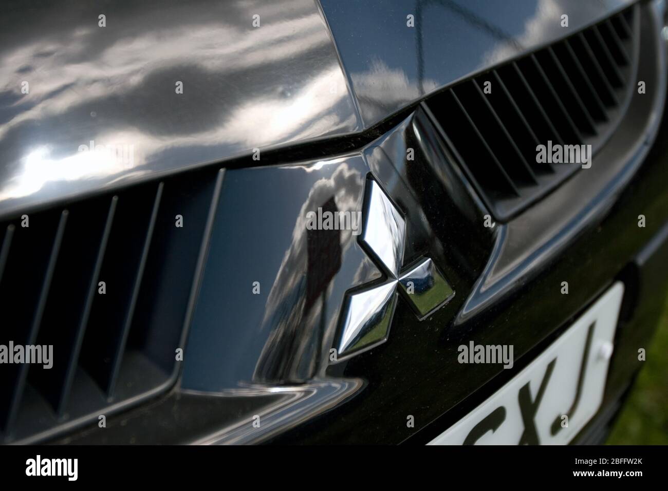 Mitsubishi Motors emblem Stock Photo - Alamy