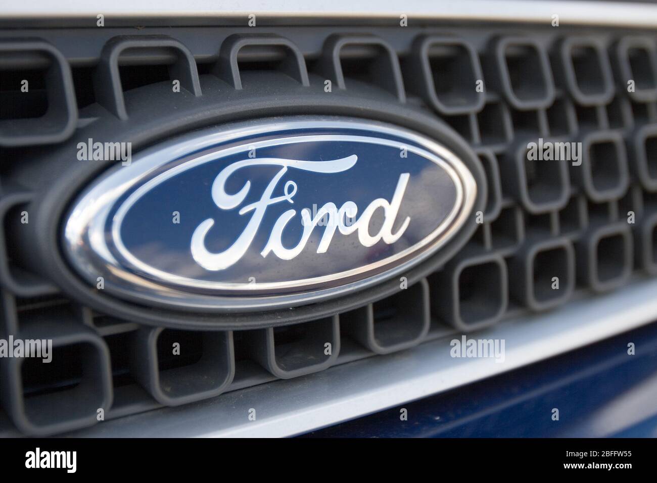 The Ford company emblem that adorns the front of every Ford motor car ...