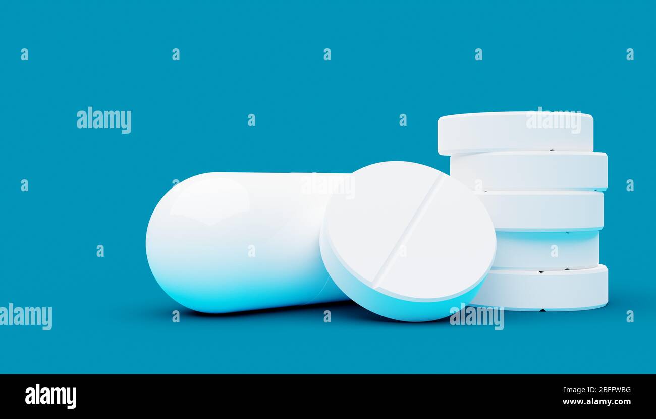 White pills or tablets and capsule on blue background, minimal pharmacy ...