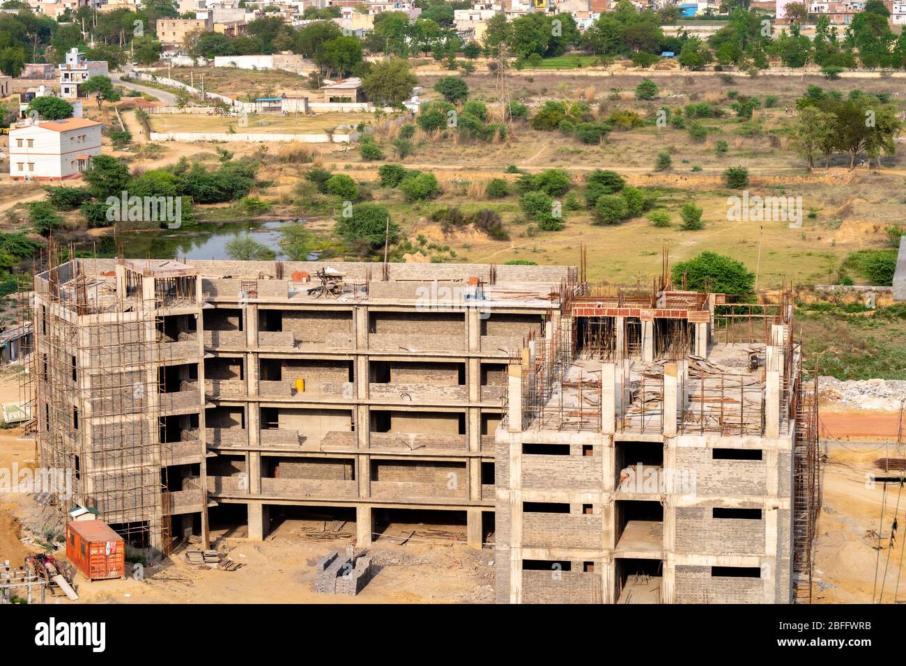 Aerial shot of the skeleton of an under construction school multi story ...