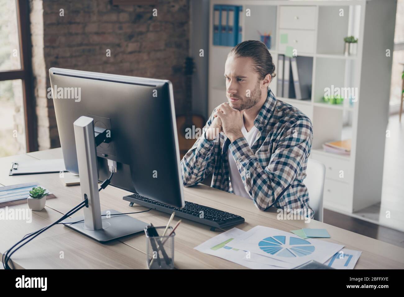 Photo of handsome business manager guy look computer monitor table ...