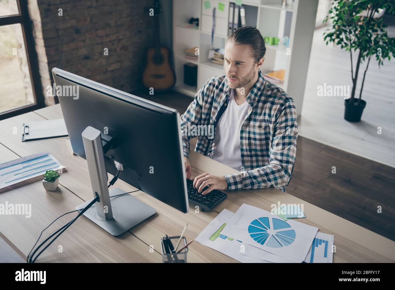 Photo of handsome business guy look computer monitor table chatting ...