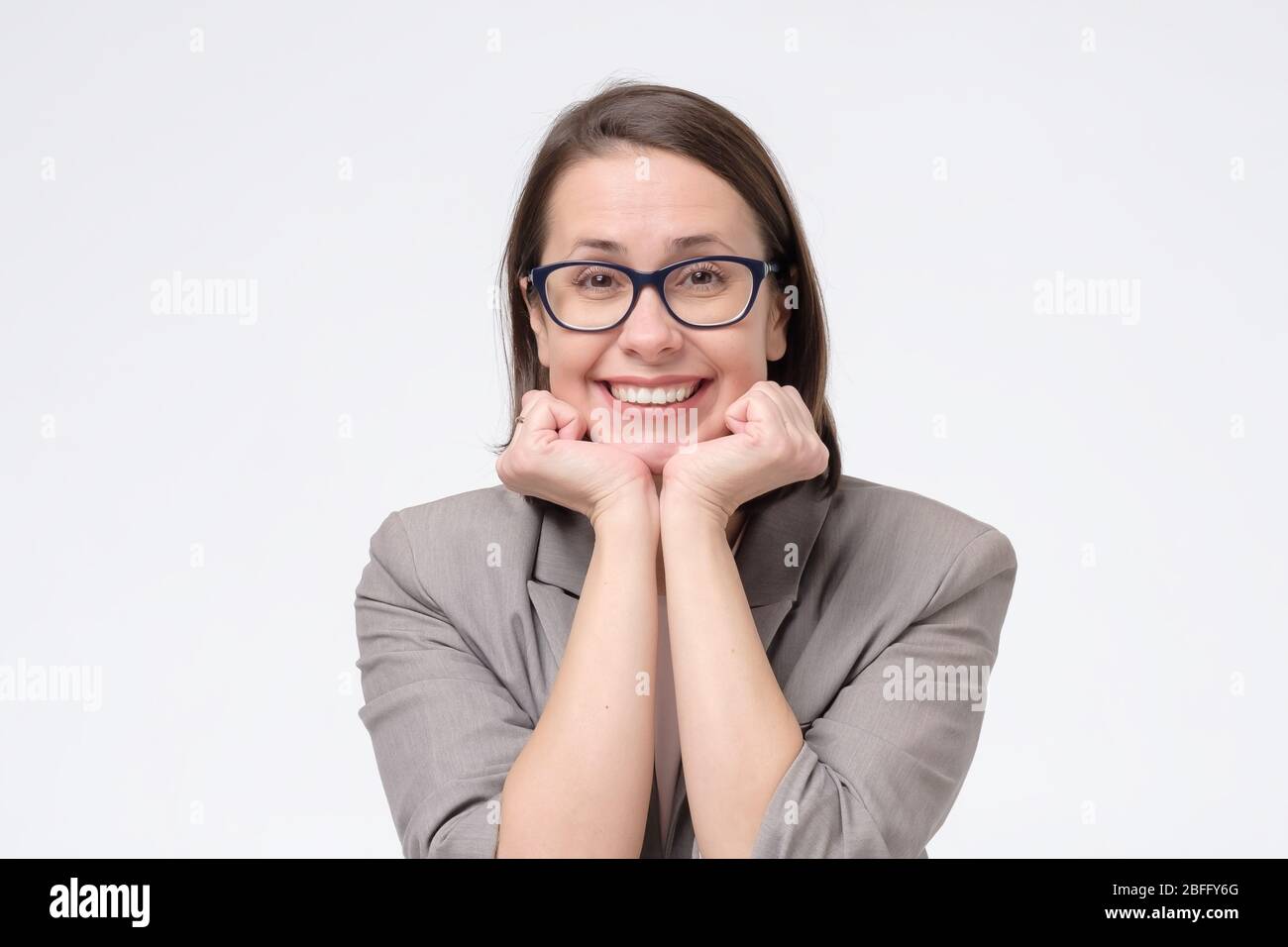 Surprised excited happy woman listening to your speech with attention ...