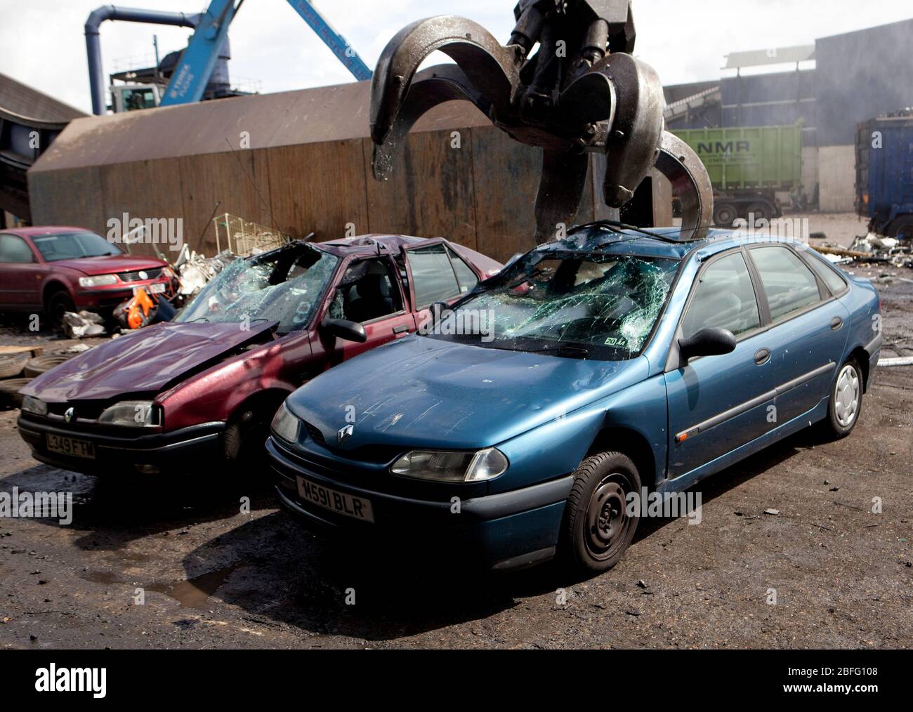 Illustrative image of cars being recycled in a scrapyard Stock Photo ...