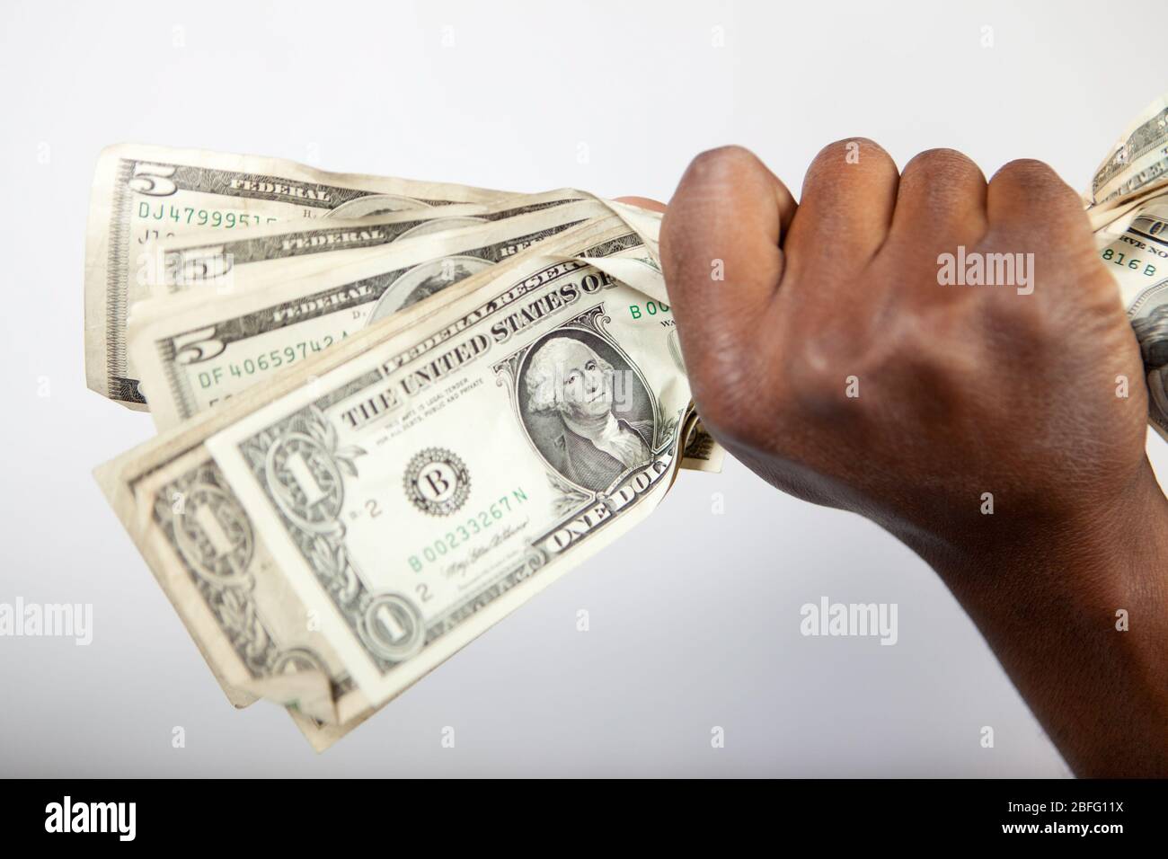 Hand Fist Full Of Money High Resolution Stock Photography and Images ...