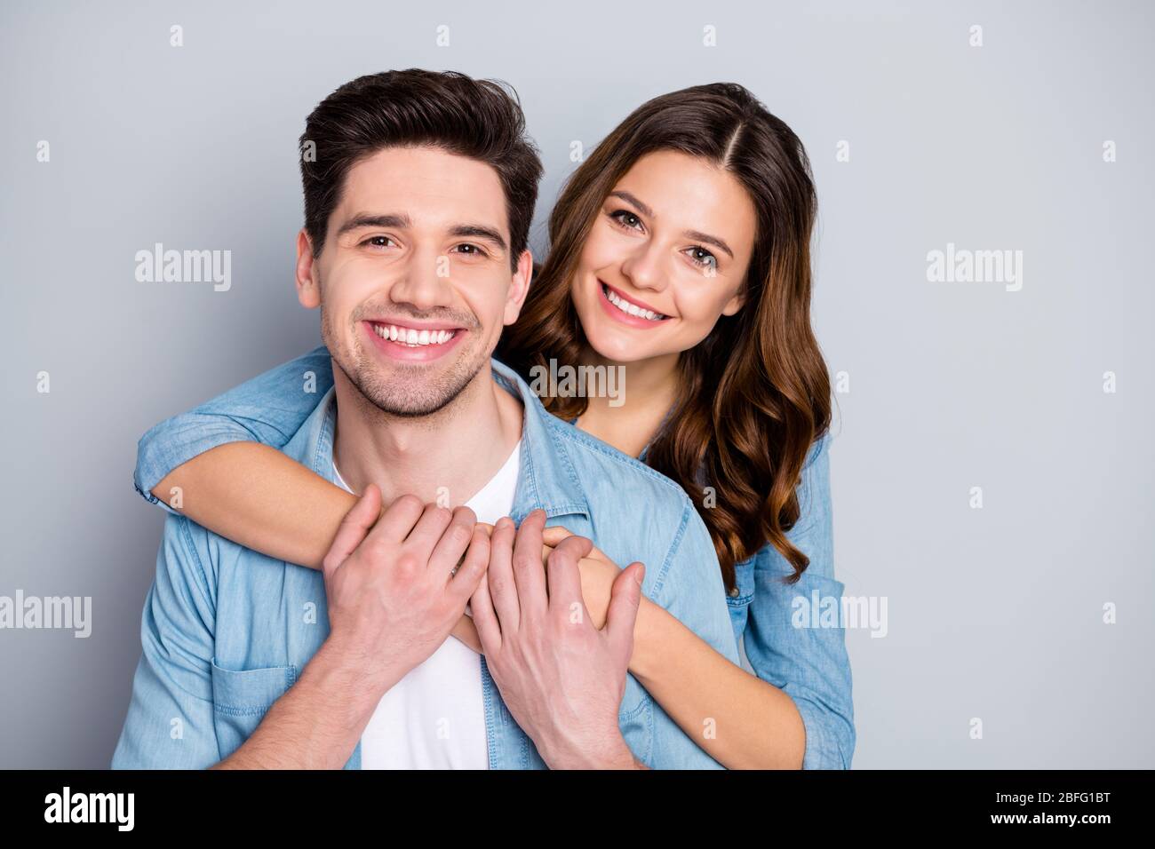 Closeup photo two people lady guy stand cuddle hugging together holding ...
