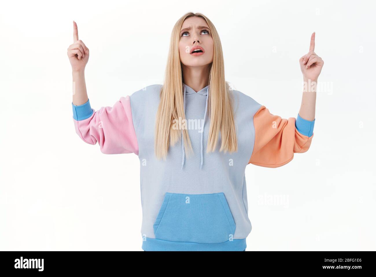 Portrait of confused, puzzled and indecisive blond girl cant understand ...