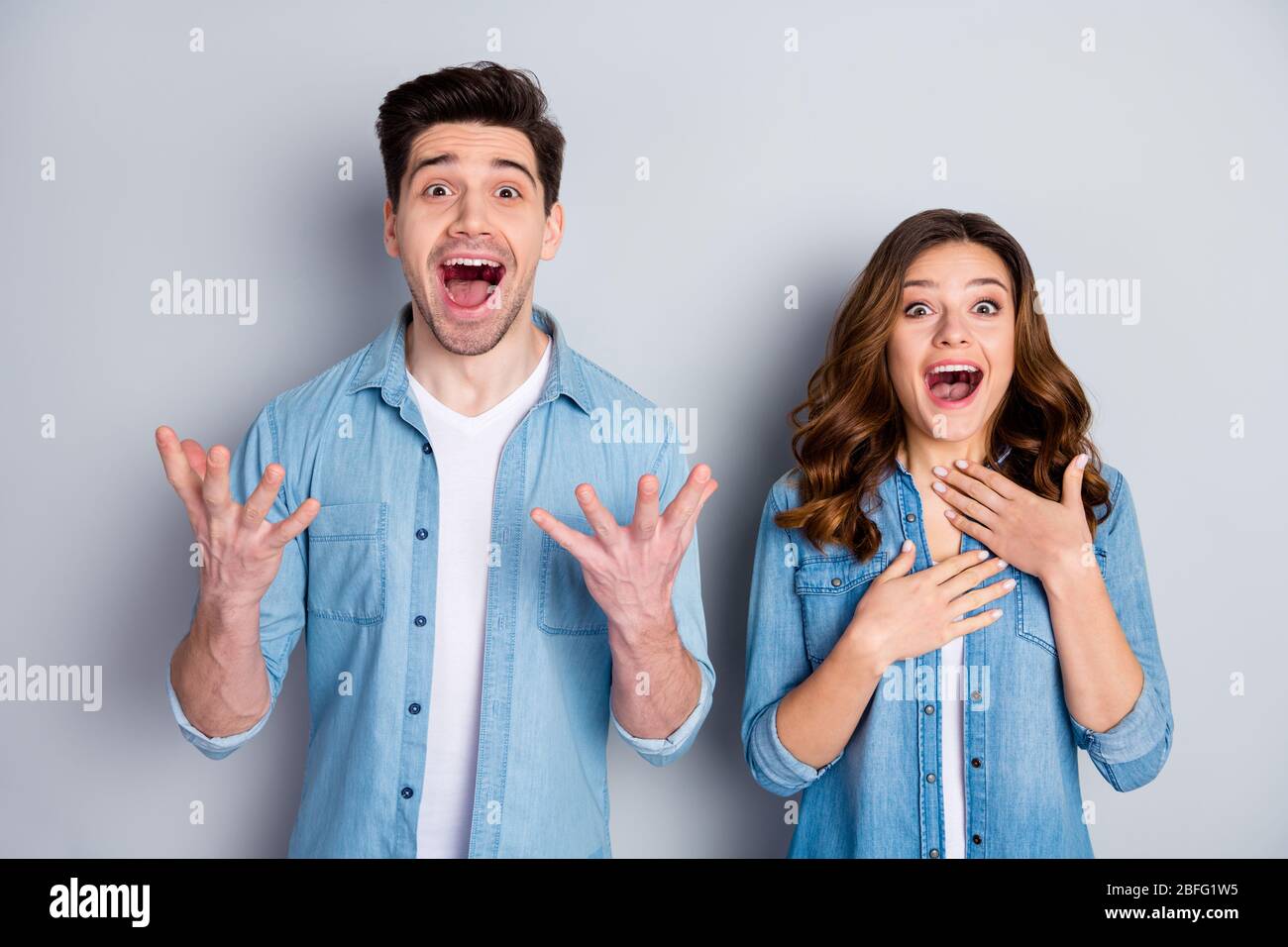 Photo two people funky lady crazy handsome guy listen good news not ...