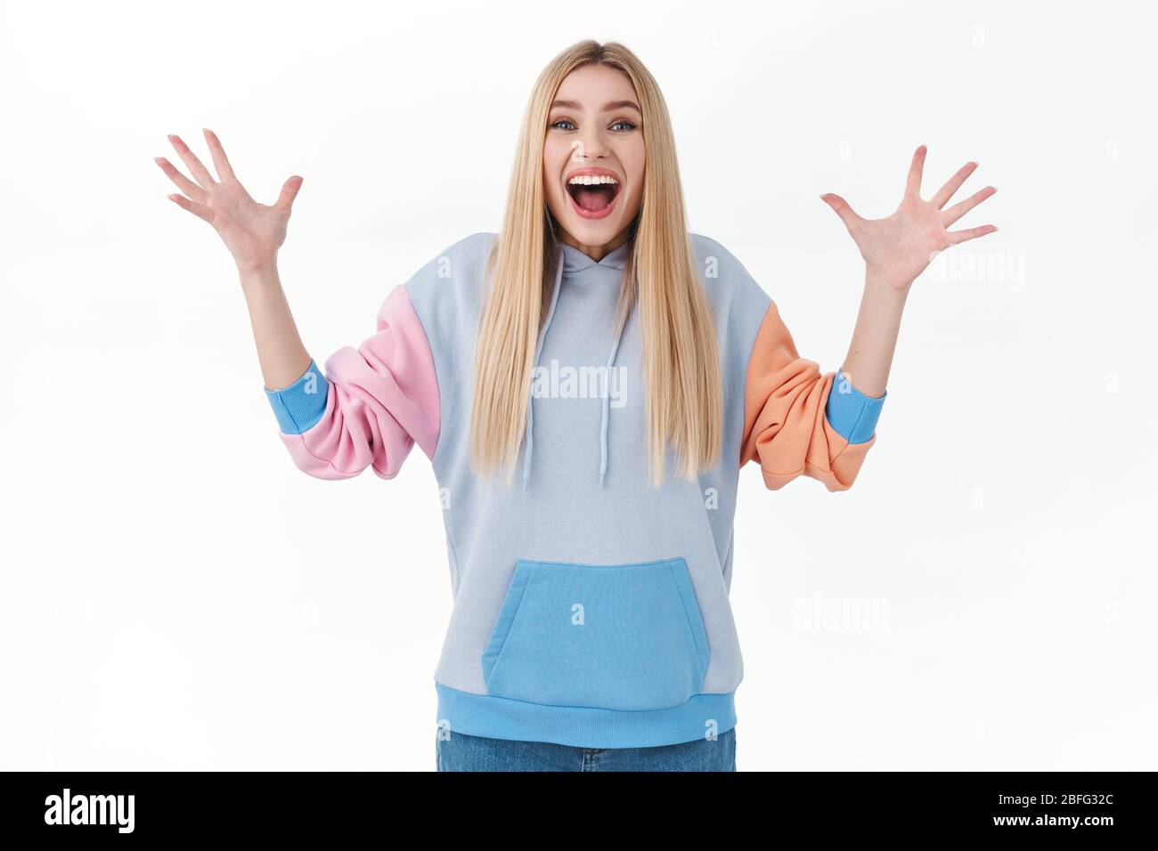 Portrait of happy excited, optimistic young blond woman celebrating ...