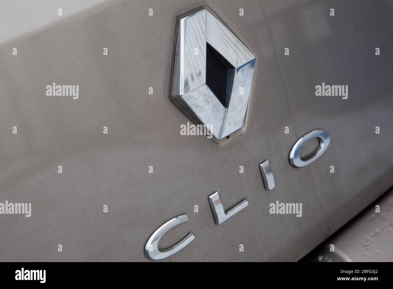 The rear of a Renault Clio. Visible are the Renault badge and the CLIO ...