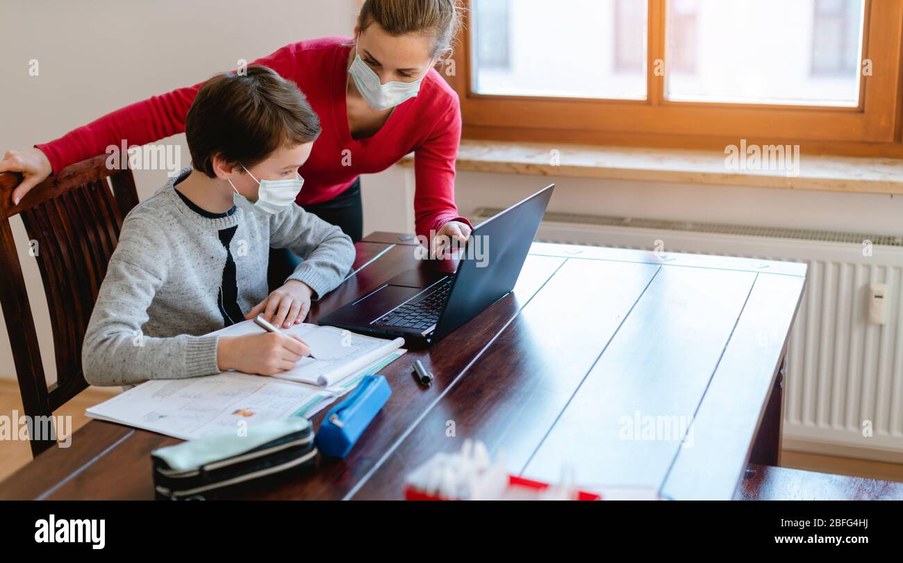 Mother son wearing masks hi-res stock photography and images - Alamy