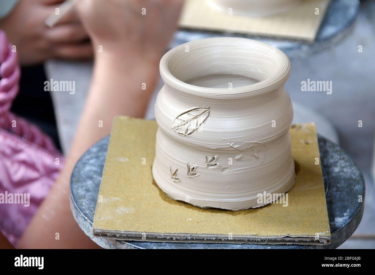 Hand making the traditional hand made pottery in Yingge District at New ...