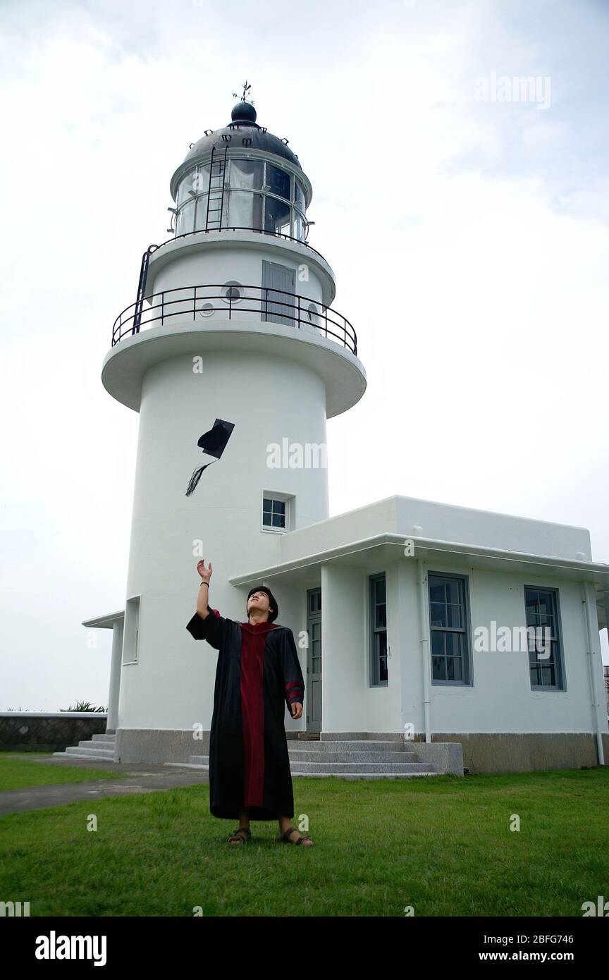 New Taipei City, JUN 11, 2005 - Graduate student throwing cap in the ...