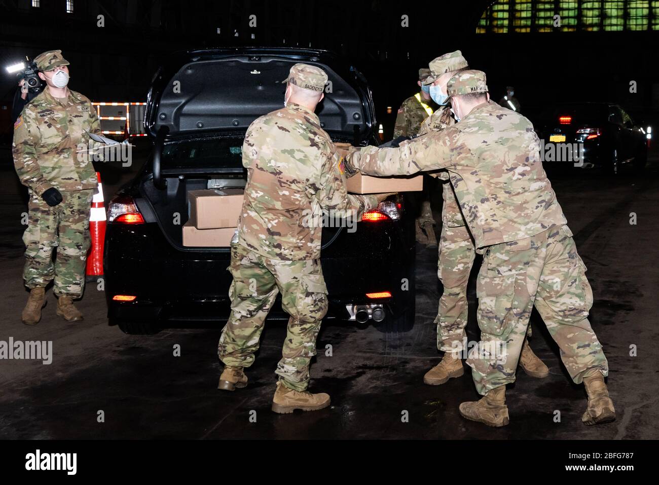 Bronx, United States. 18th Apr, 2020. Soldiers of the U.S. Army load ...