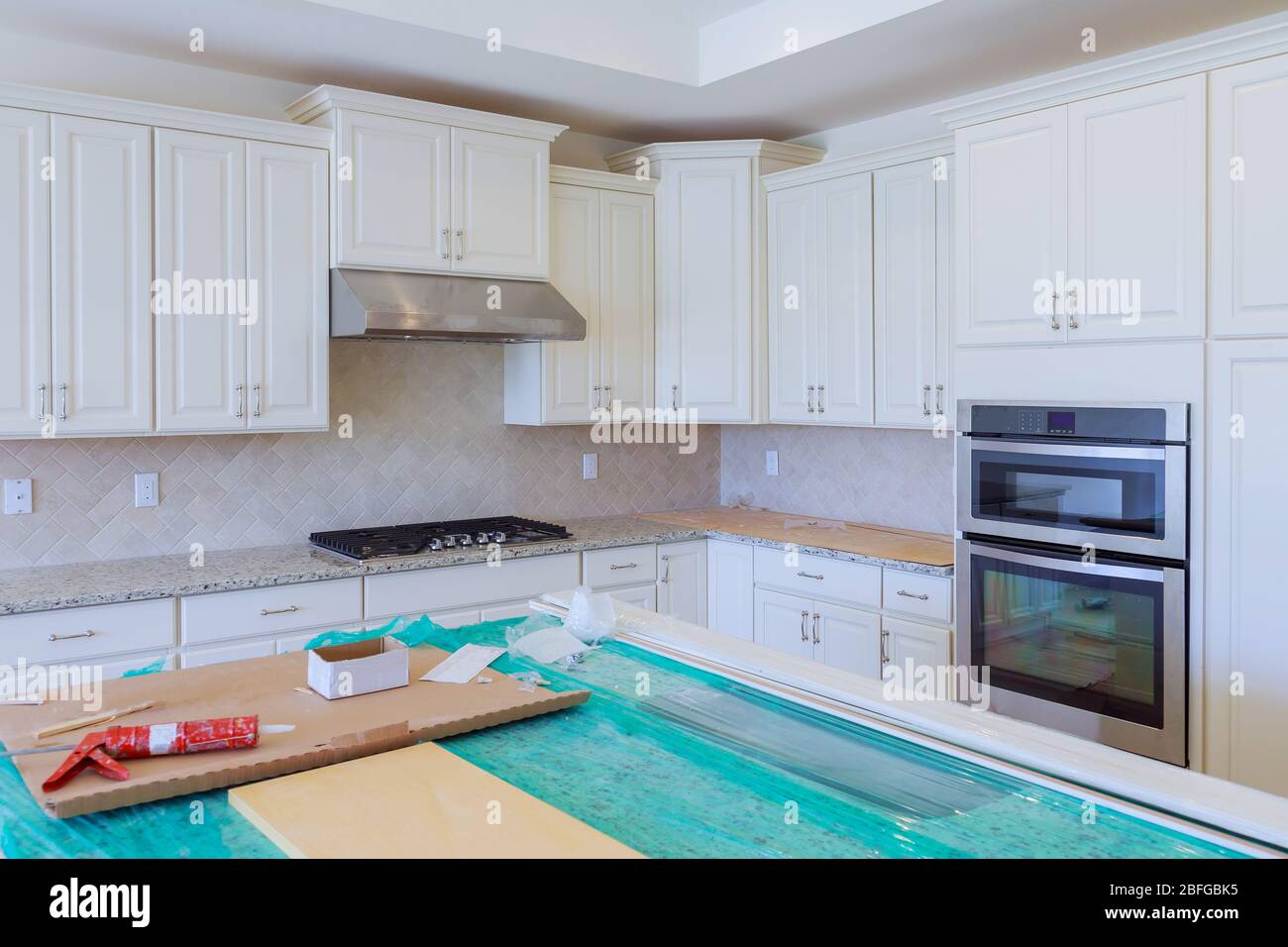 Kitchen custom cabinets of installation base for island in center Stock ...