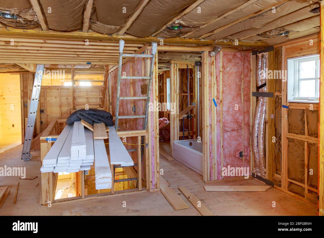 Mineral glass wool in a warming the walls with fiberglass on a inclined ...