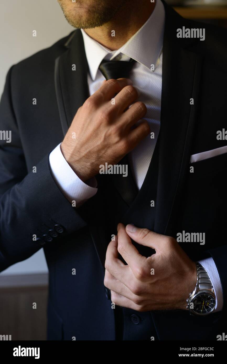 Businessman standing suit clothes hi-res stock photography and images ...