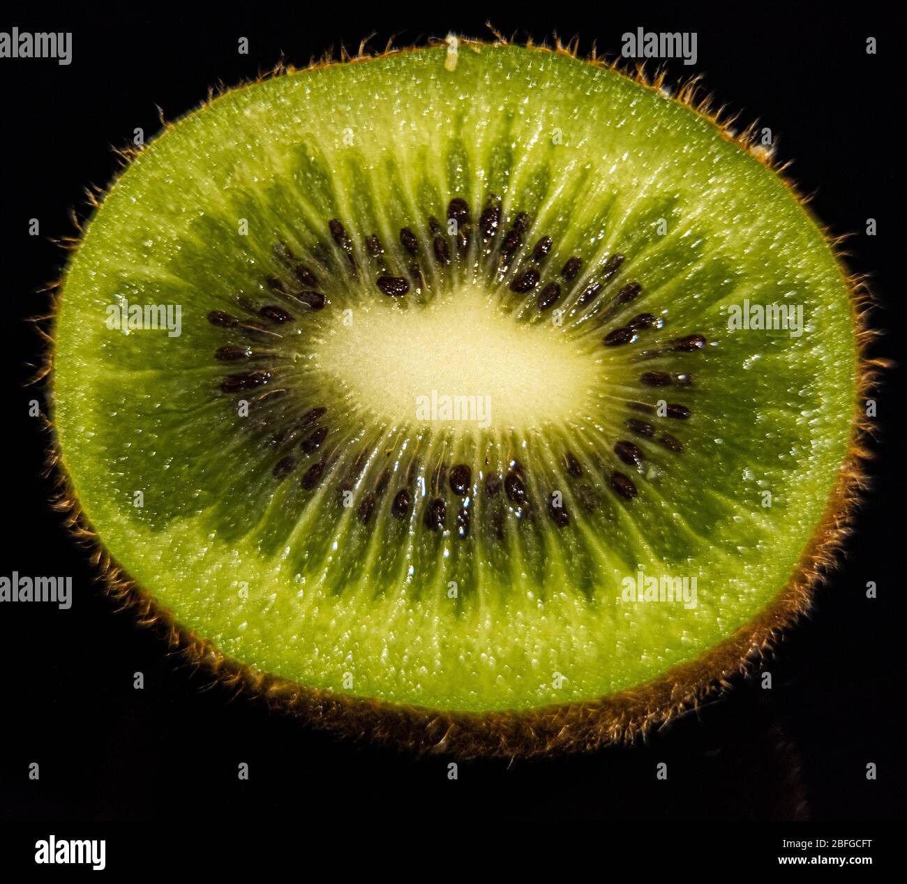 Macro shot of sliced Kiwi fruits Stock Photo - Alamy
