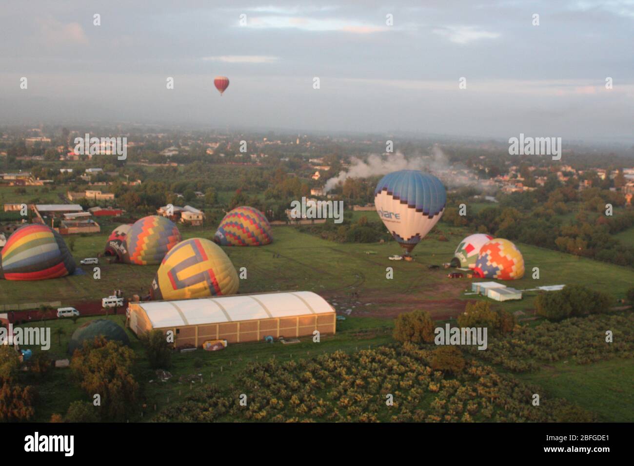 balloons taking off Stock Photo - Alamy