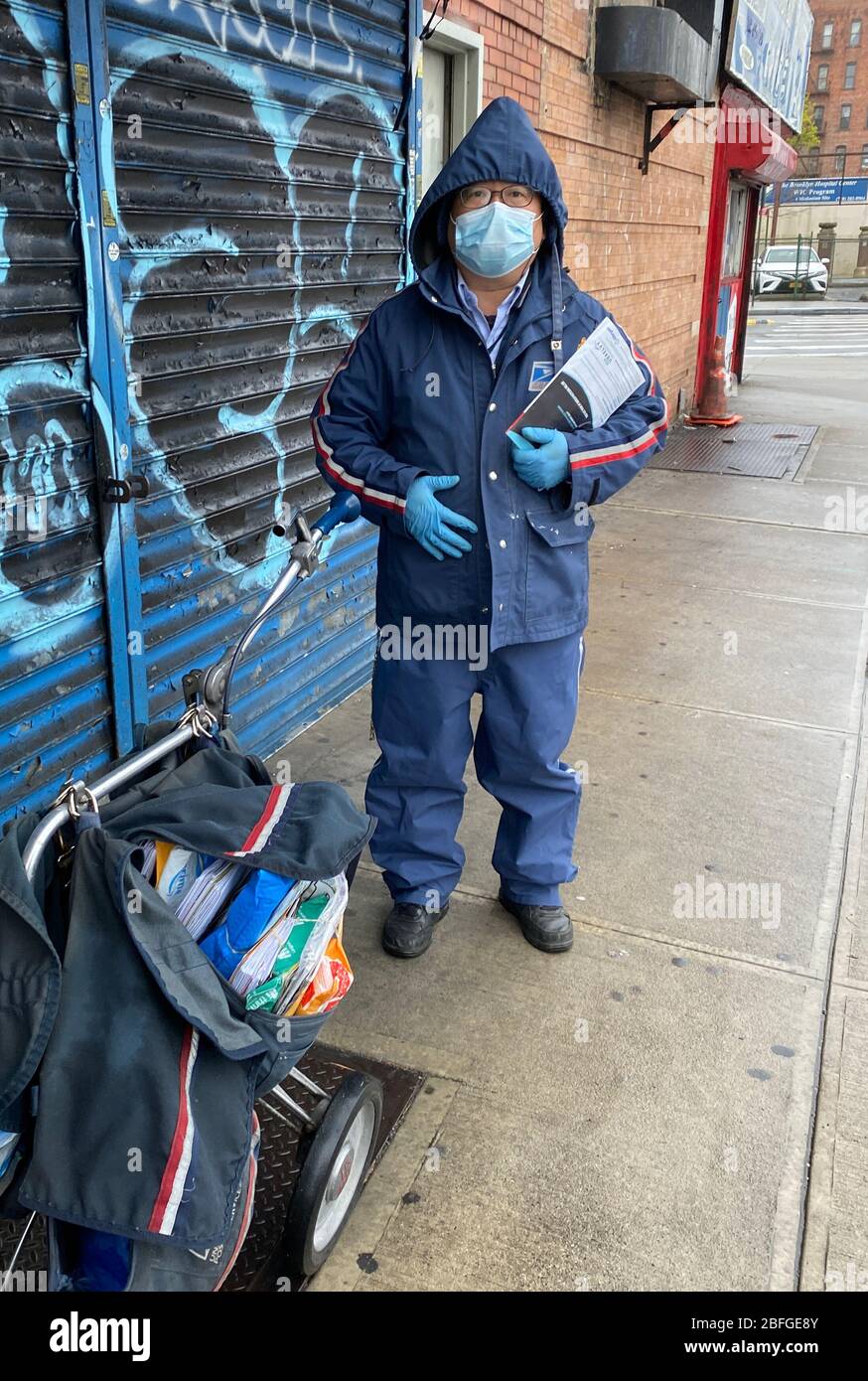 Portrait of a postal worker on the street in Brooklyn, NY, one of the ...