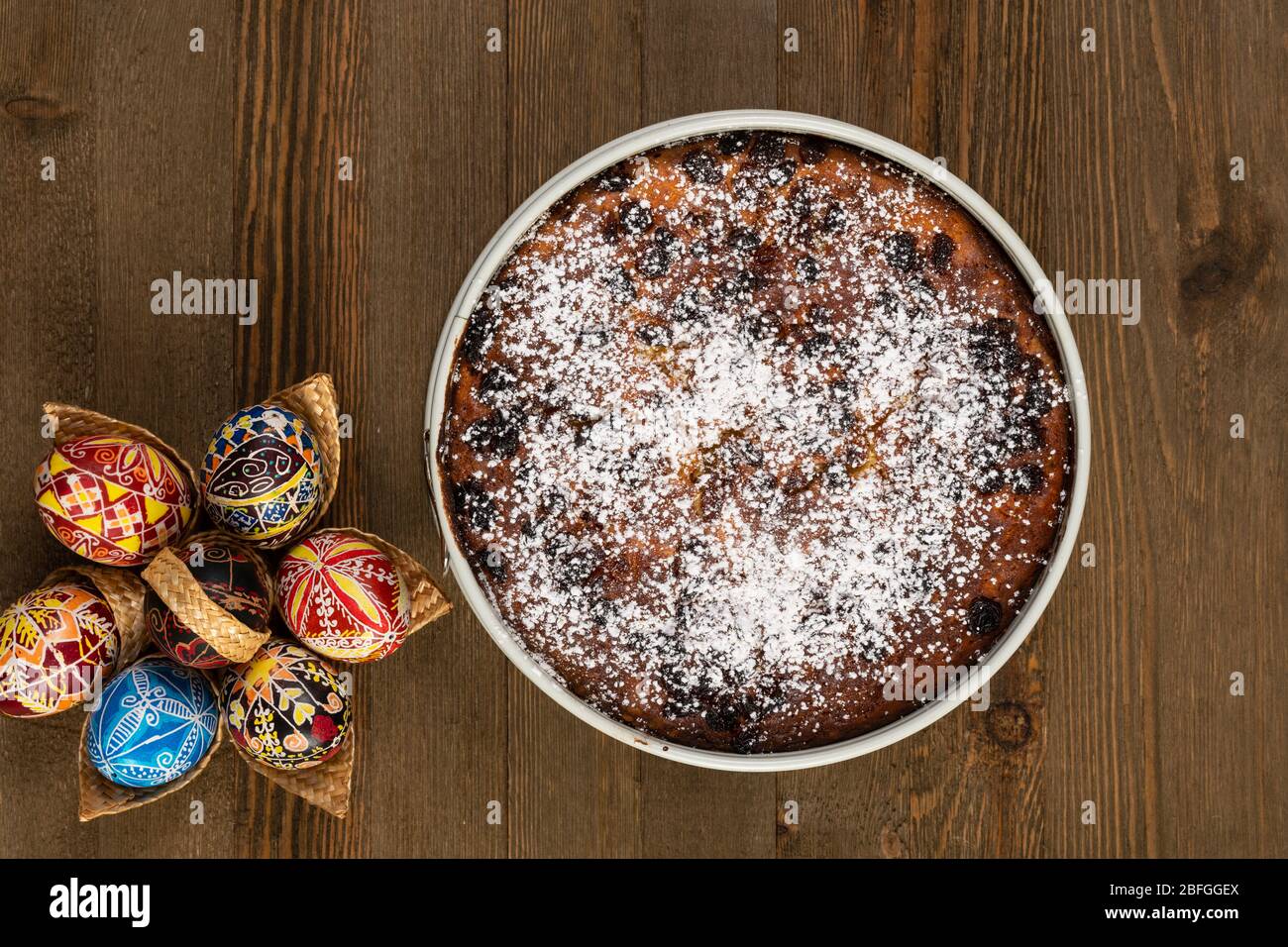 Traditional romanian cake called Pasca with hand painted Easter eggs on ...