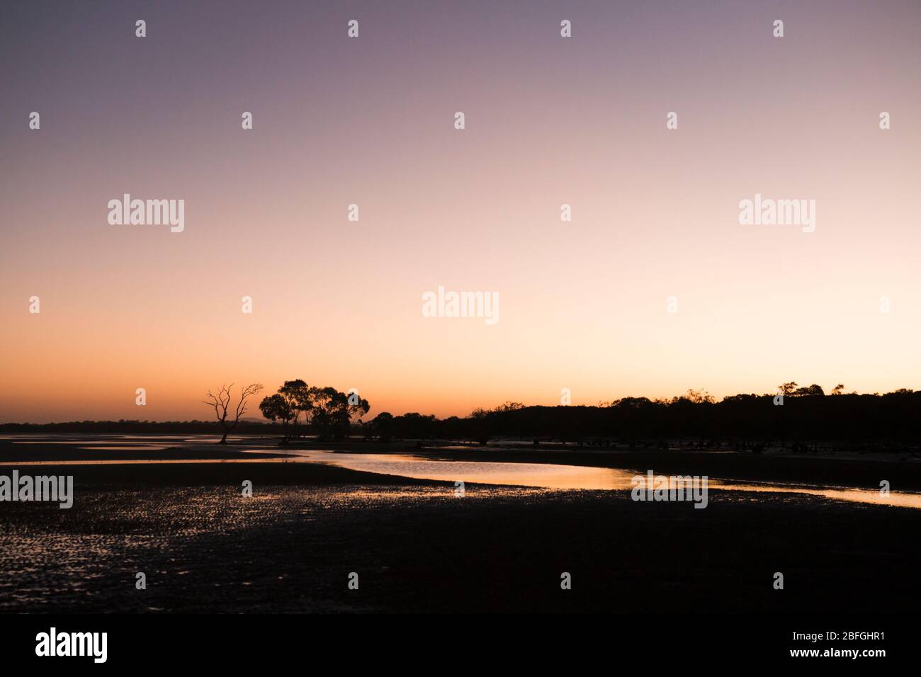 Sunset landscape on beach at Beachmere, Queensland, Australia Stock ...