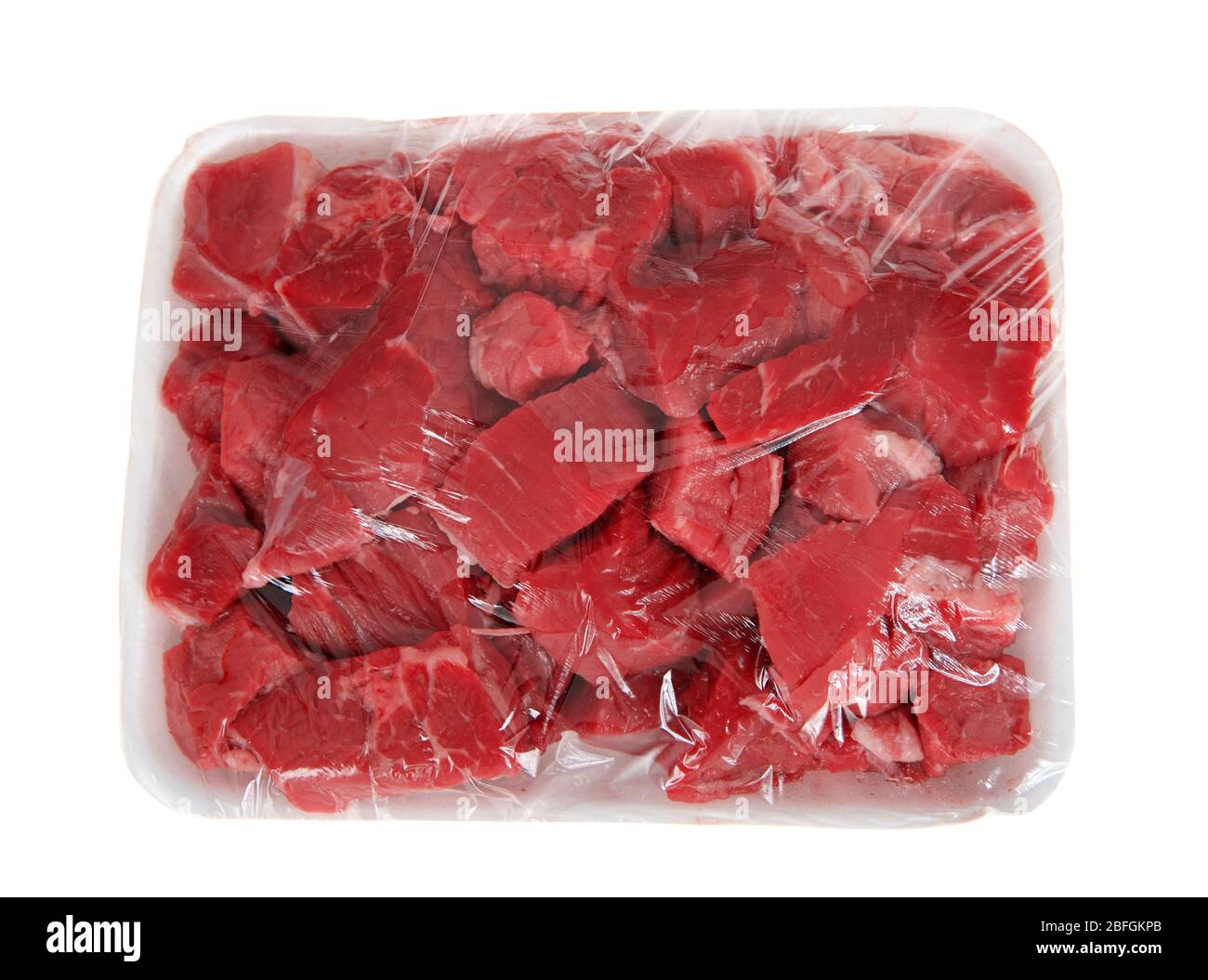 White Foam tray with fresh stew meat wrapped in plastic, isolated on ...