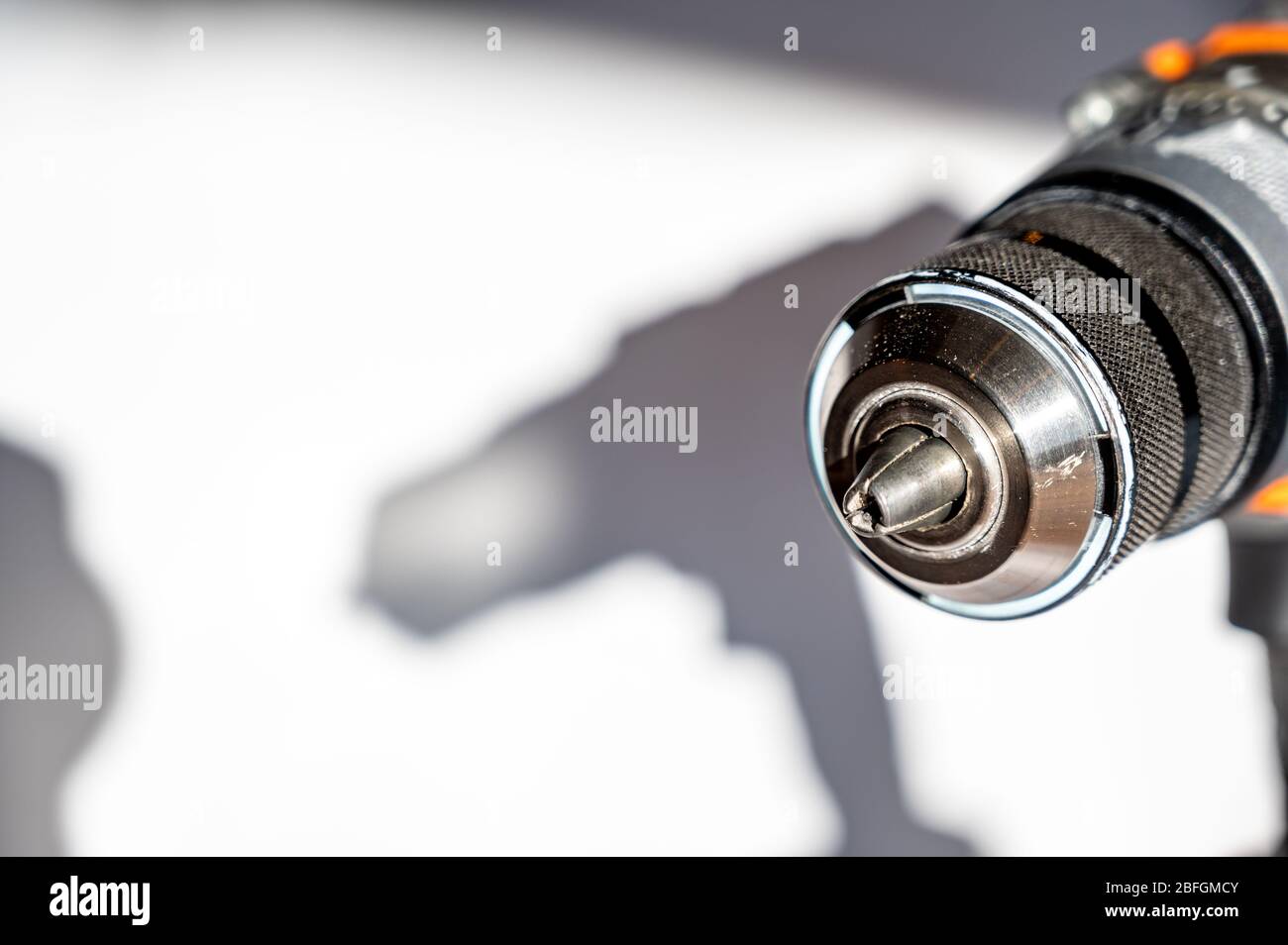 metal keyless chuck on drill and impact driver extended in the closed ...