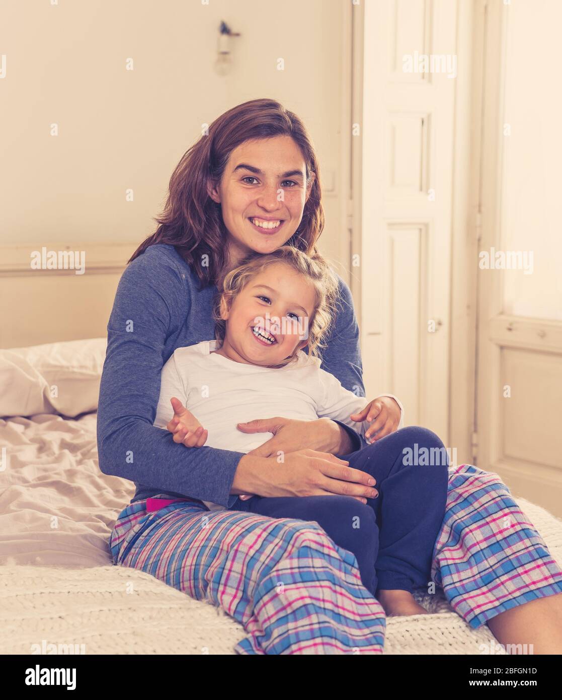 COVID-19 Quarantine. Happy single parent woman and little daughter ...