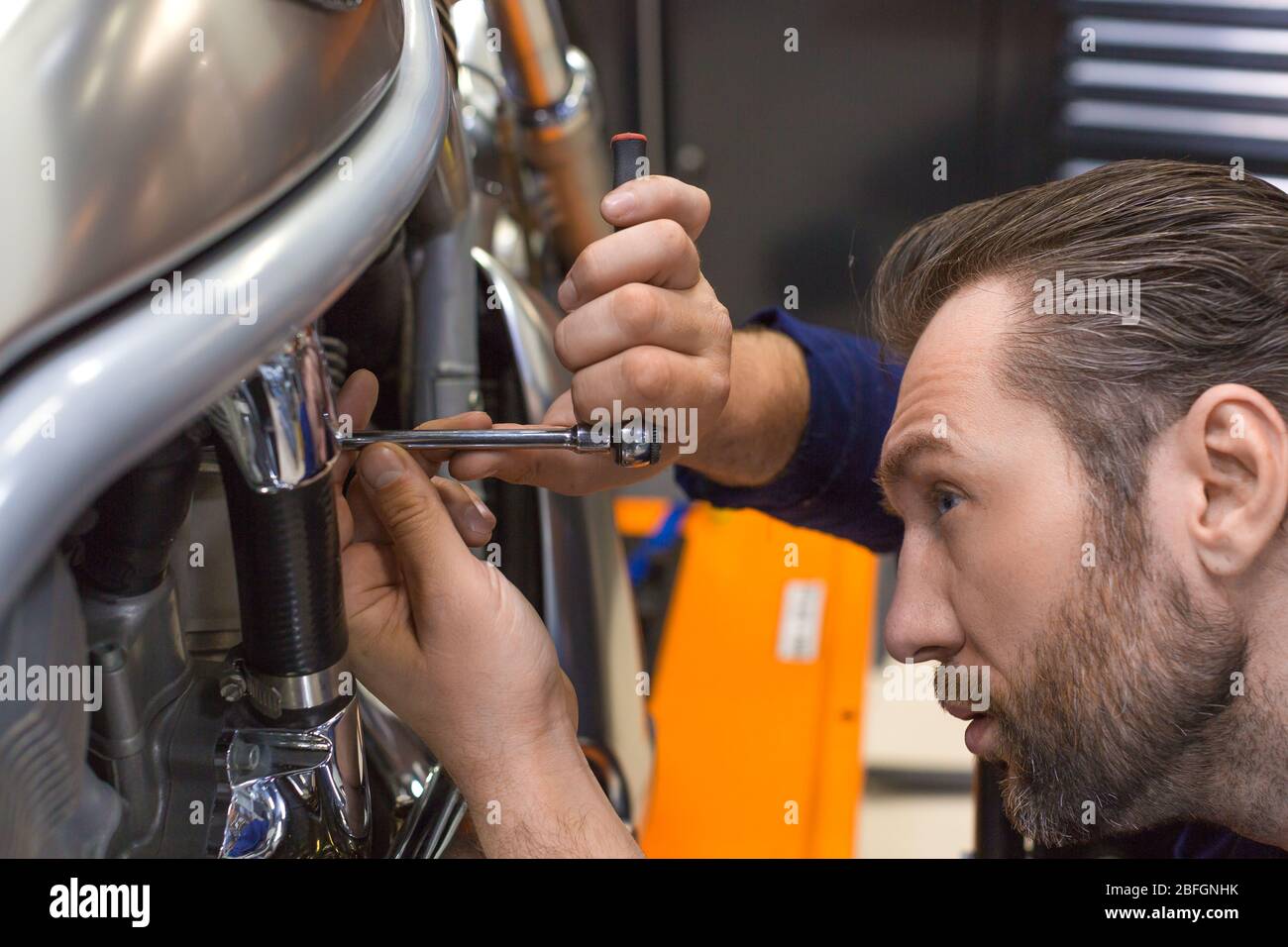 Repairman in overalls fixing hi-res stock photography and images - Alamy