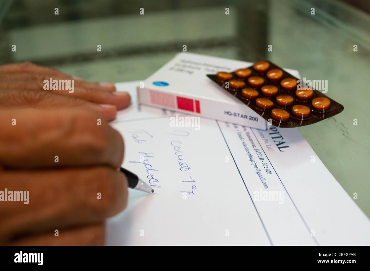 Jaipur, India Circa 2020 - Photograph of a doctor writing a coronavirus ...