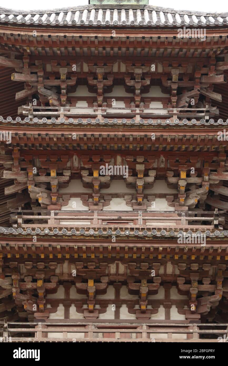 Close-up view of the intricate wooden and tile construction of the ...