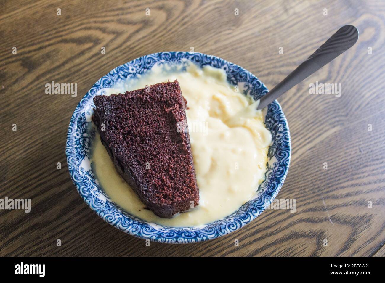 Chocolate Cake and Custard Stock Photo - Alamy