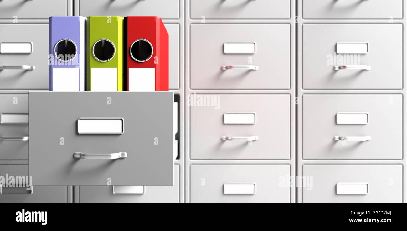 Office file folders in an open cabinet drawer closeup view. Document ...