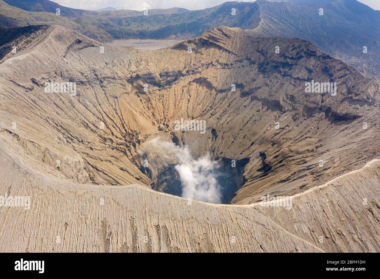 Aerial view of steam and gas venting from the active crater of the ...