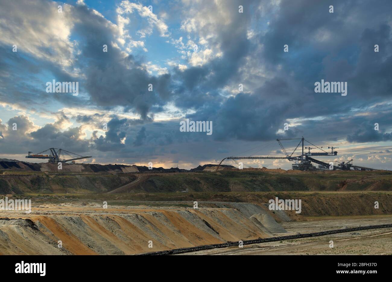 open pit coal mine with excavators and machinery Stock Photo - Alamy