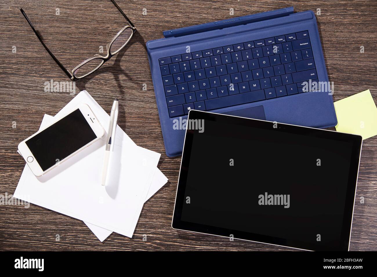 Office desk and technology top view Stock Photo - Alamy