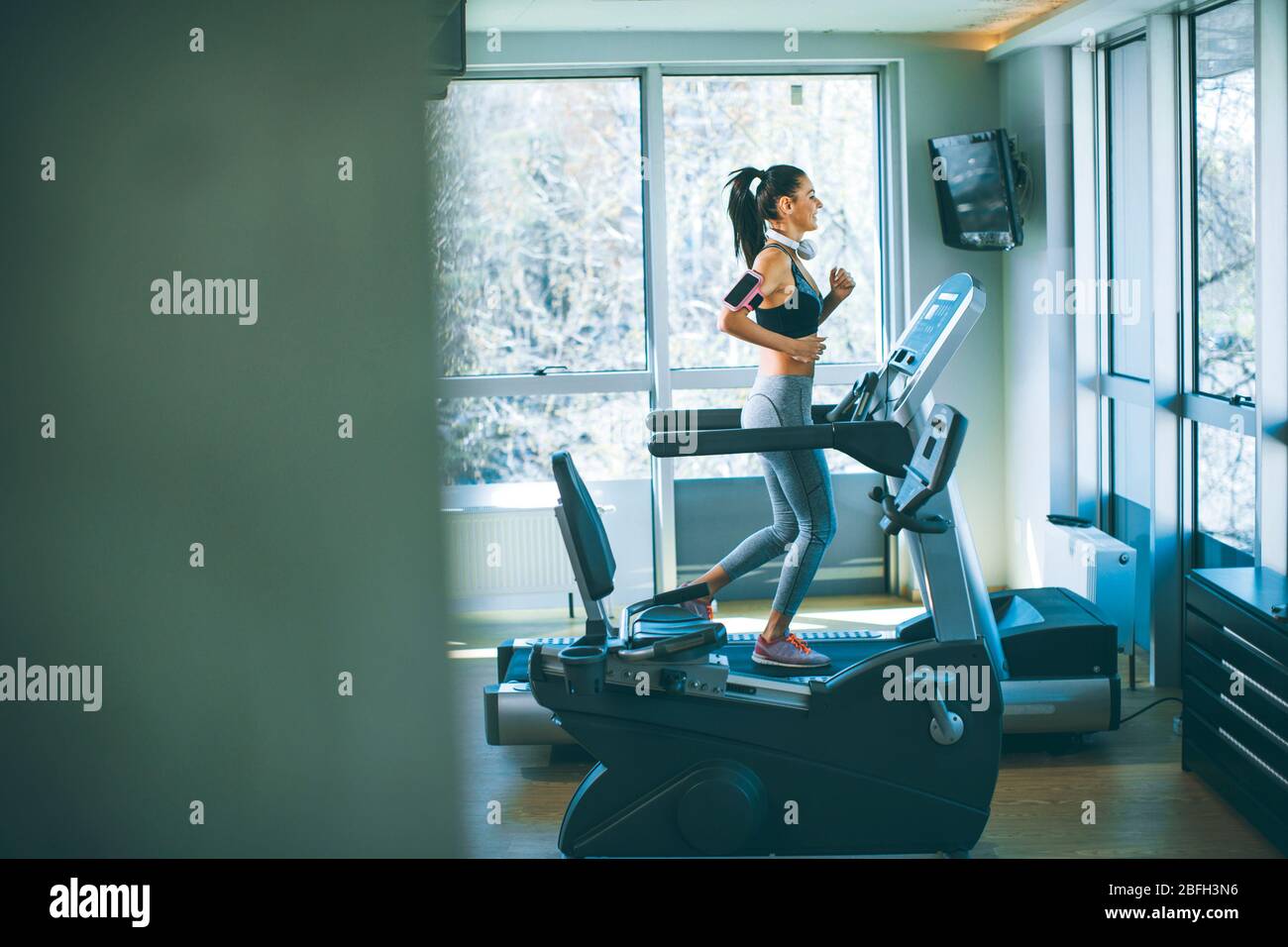 Young attractive female treadmill runner hi-res stock photography and ...