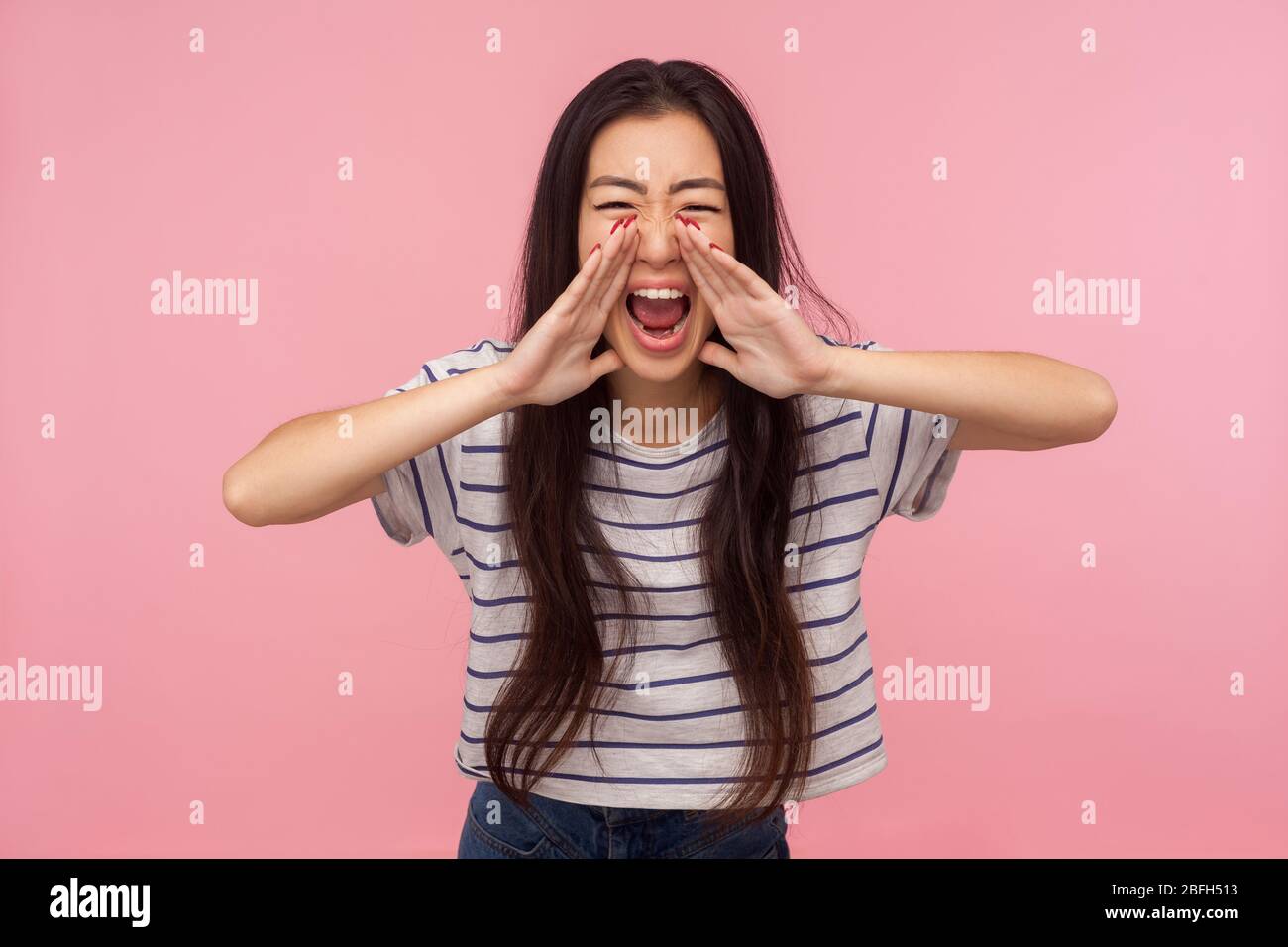 Attention, important message! Portrait of aggressive girl with long ...