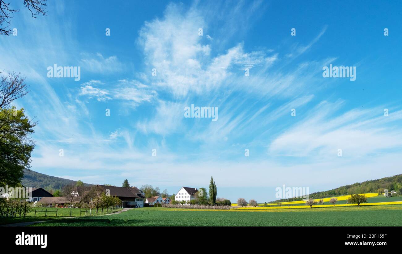 Gorgeous blue sky with clouds in spring Stock Photo - Alamy