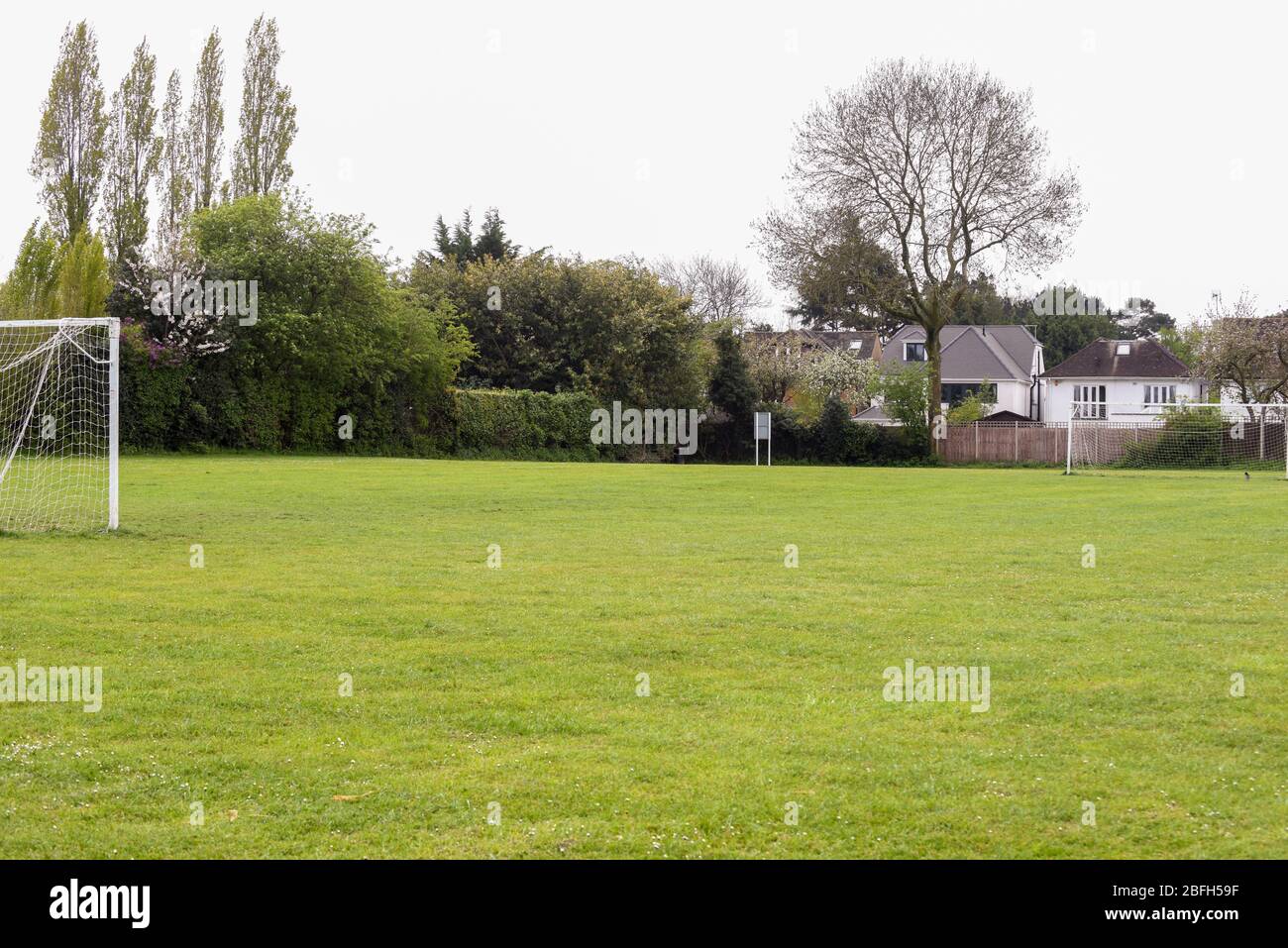 Empty football pitch in public park with no people Stock Photo - Alamy