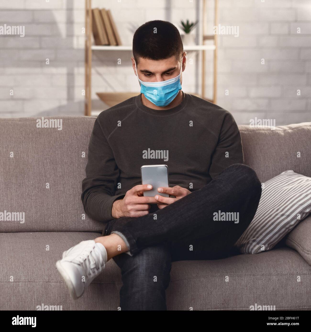 Man using face mask safe hi-res stock photography and images - Alamy