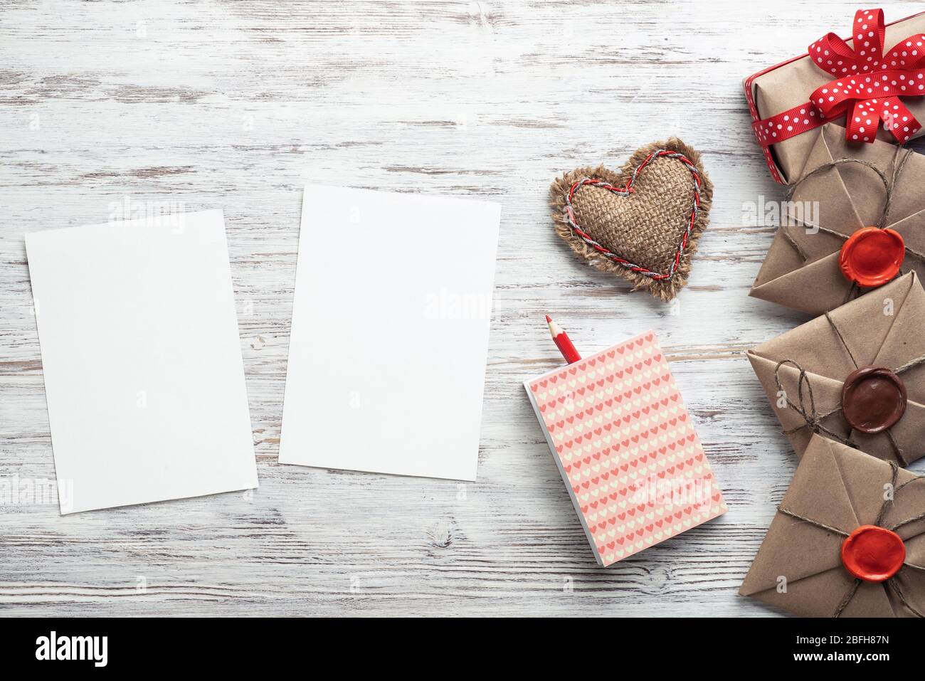 Flat lay cute composition with fabric heart Stock Photo - Alamy