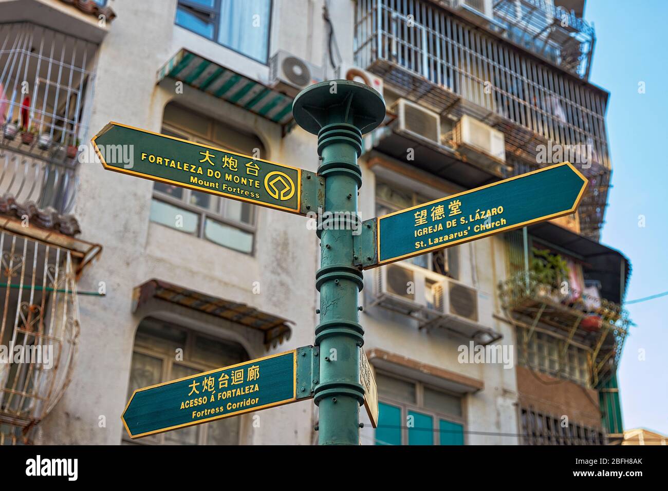 Pole with direction signs to Mount Fortress and other attractions in ...