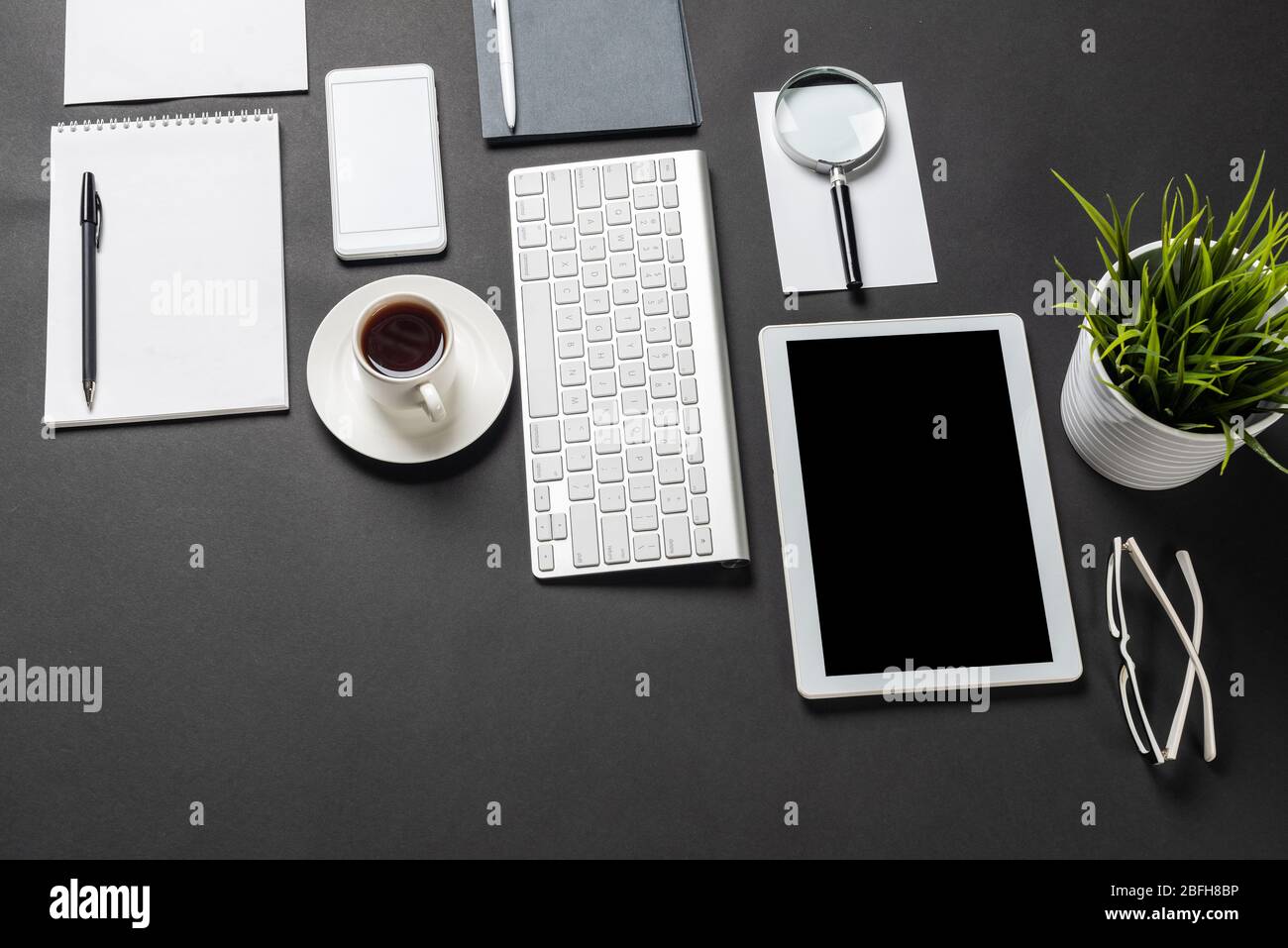 Top view of workplace with digital devices Stock Photo - Alamy