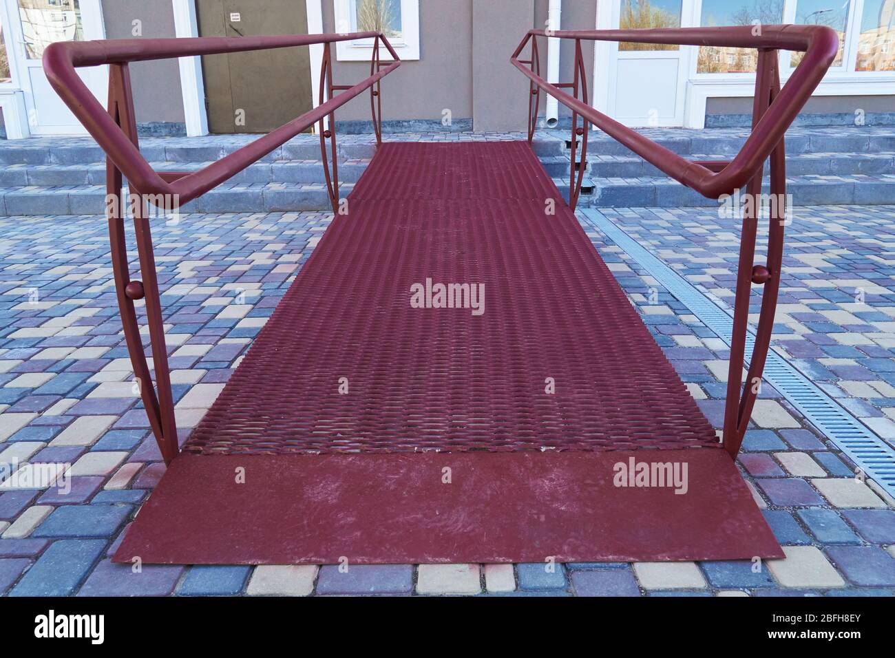 Wheelchair access ramp for entrance of residential multistory building ...