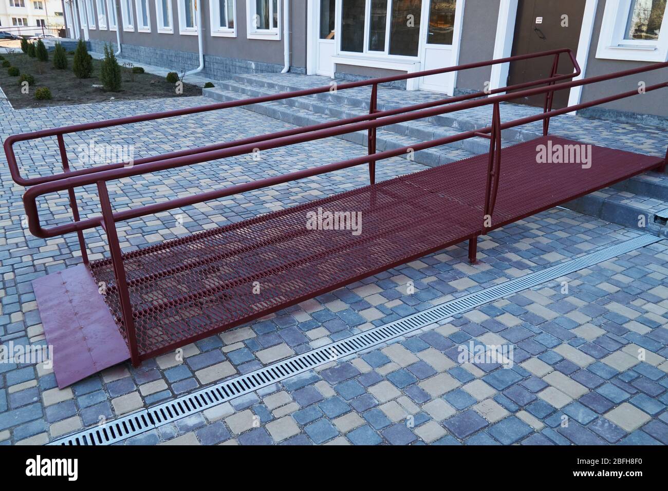Wheelchair access ramp for entrance of residential multistory building ...