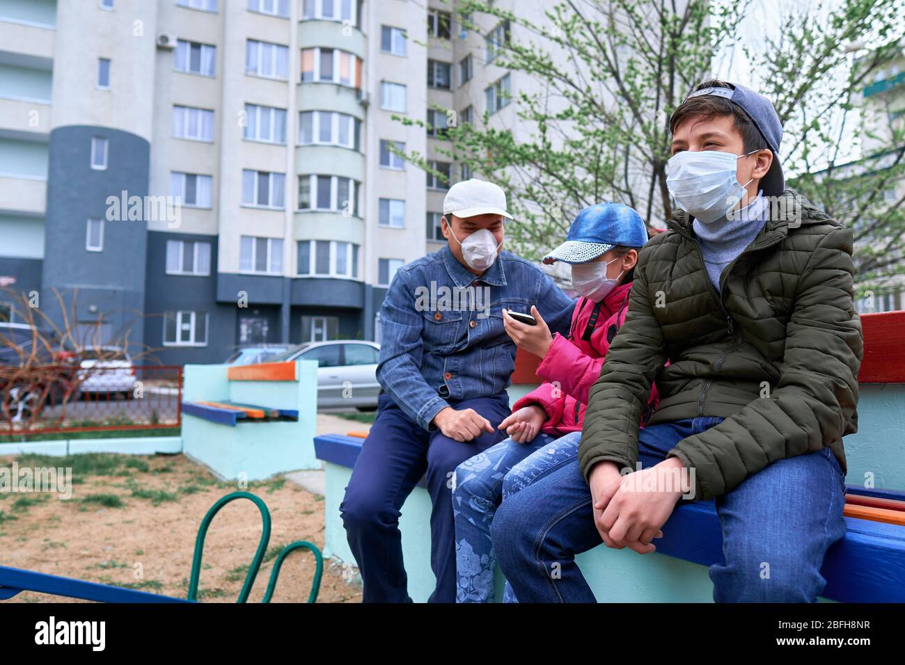 Father protects family hi-res stock photography and images - Alamy