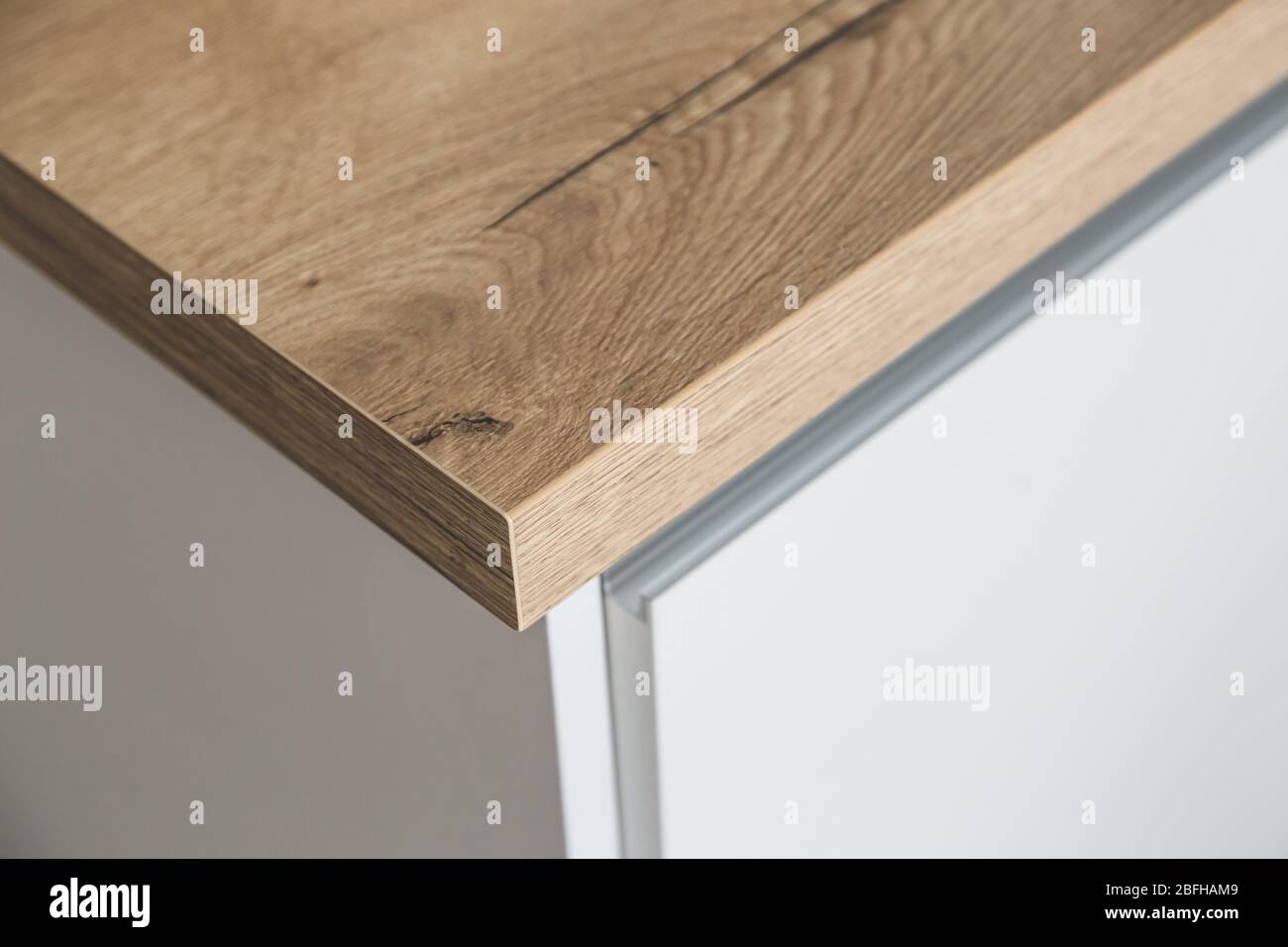 Corner of a modern kitchen worktop in the interior of a white kitchen ...
