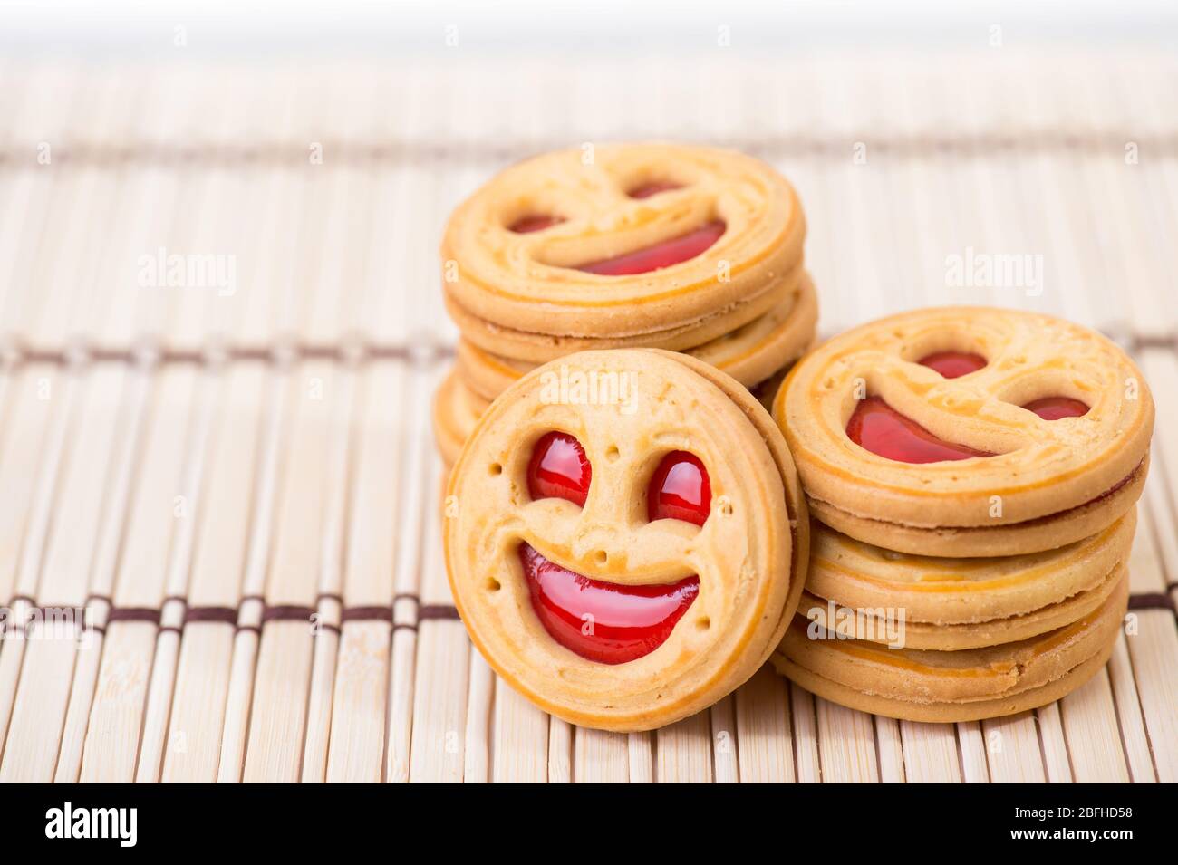smiling strawberry jam cookies. Close up photo Stock Photo - Alamy